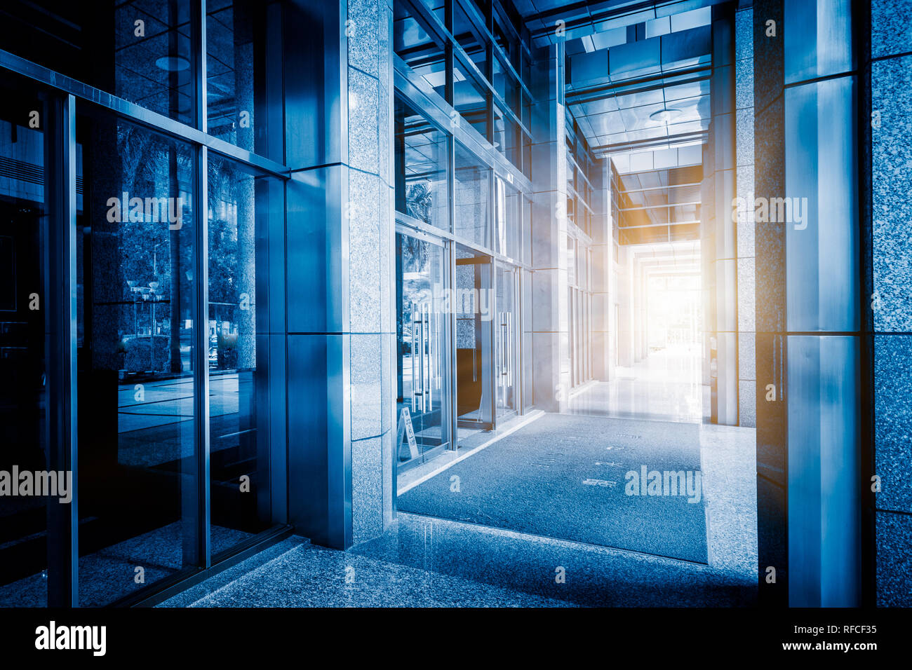 modern glass office building,blue toned Stock Photo - Alamy