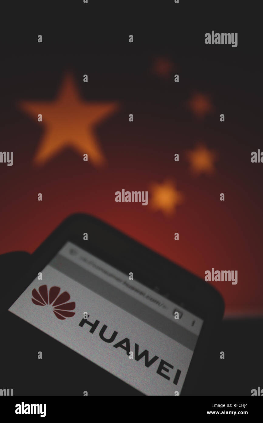 Huawei logo on its website is shown on a smartphone display, People's ...
