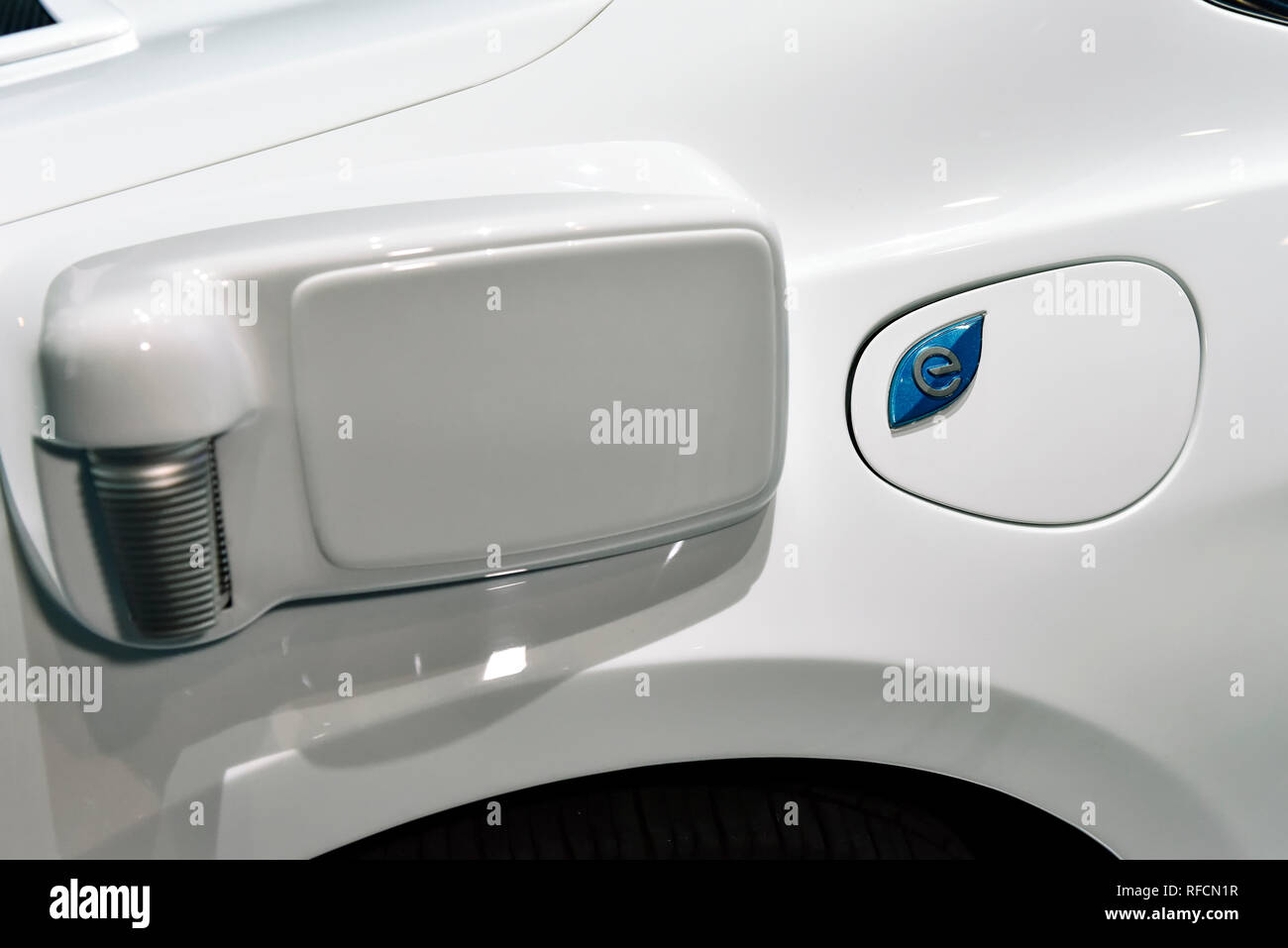 Electric car charging cap Stock Photo - Alamy