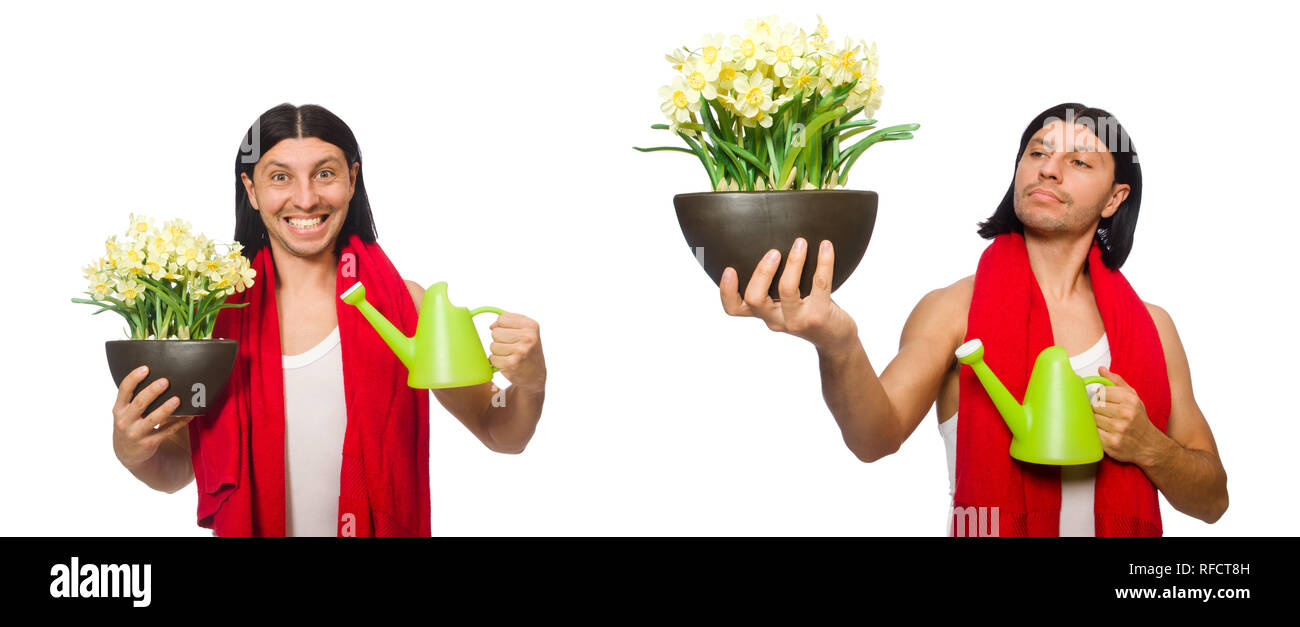 Young man watering flowers isolated on white Stock Photo - Alamy