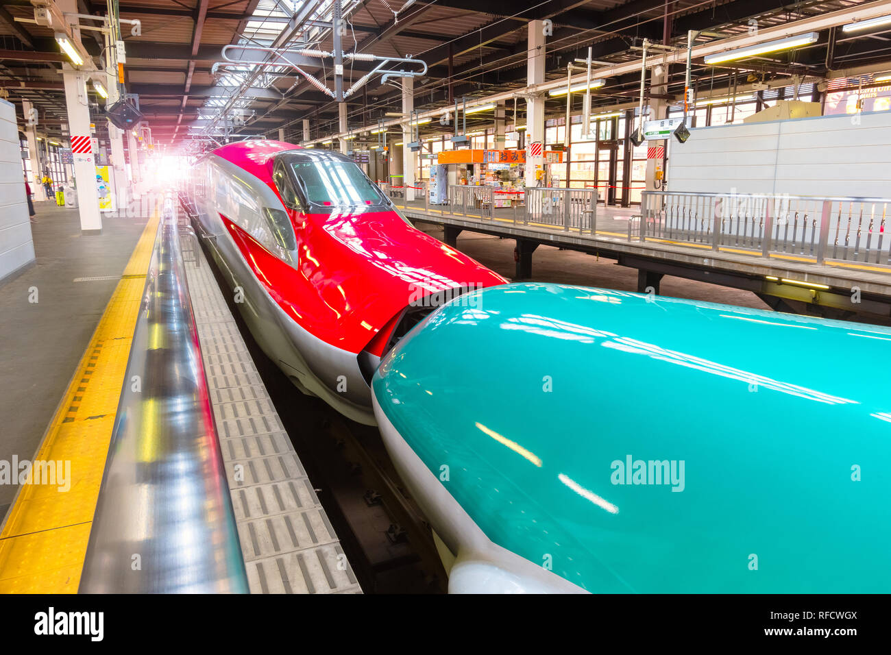 Iwate , Japan - April 22 2018: Japanese Shinkansen high speed train Hayabusa (green) and Komachi ...