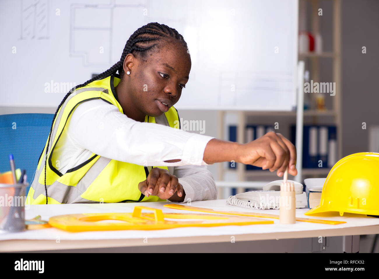 Young black architect working on project Stock Photo - Alamy