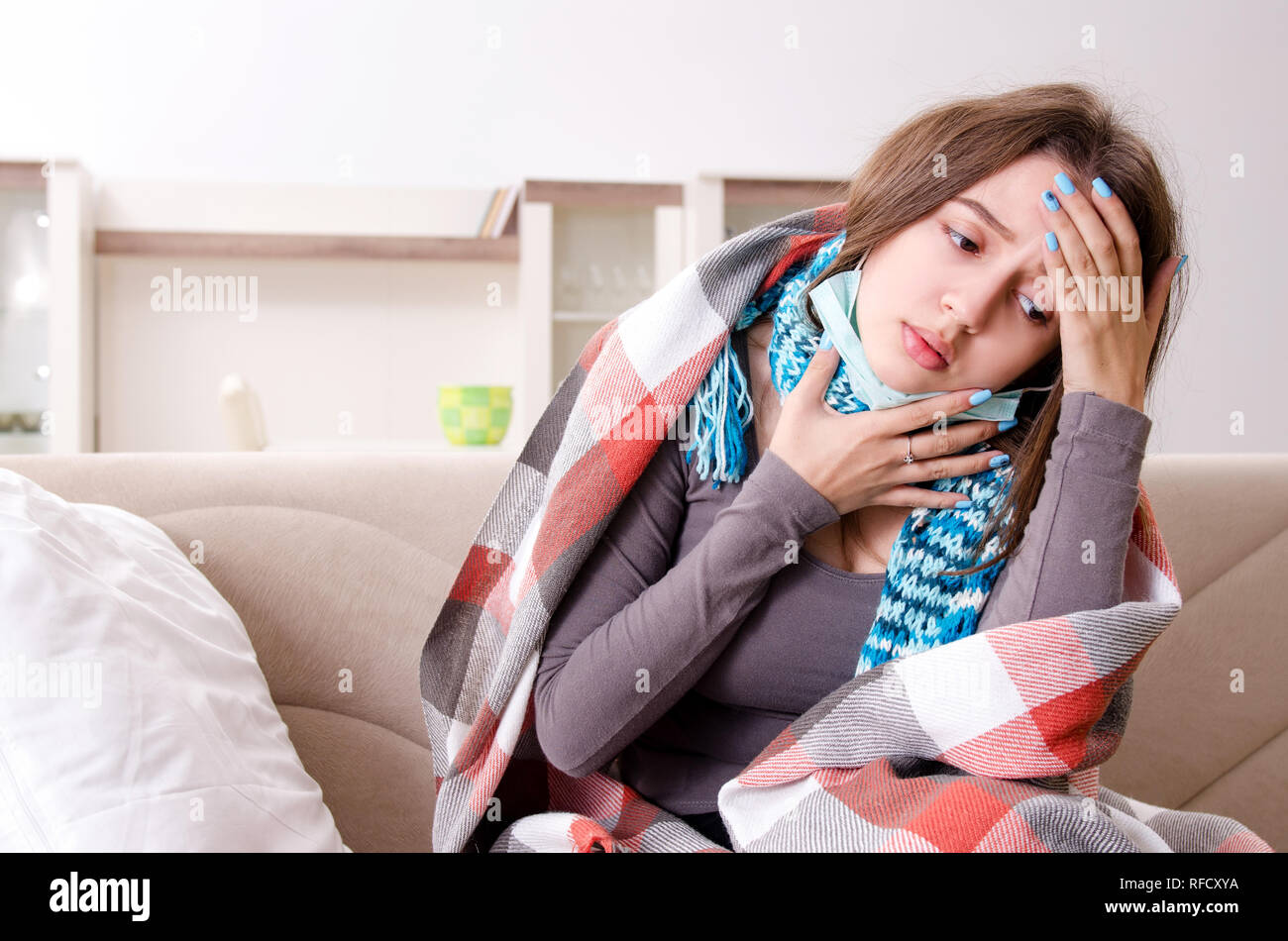 Sick young woman coughing lying hi-res stock photography and images - Alamy