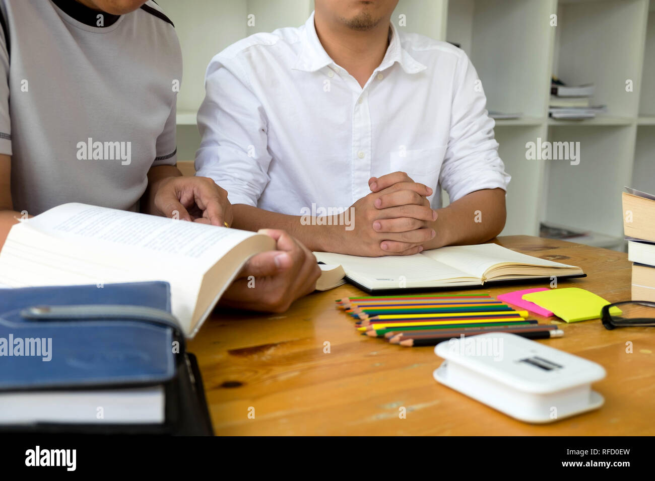 Students helps friend teaching and learning subject additional in ...