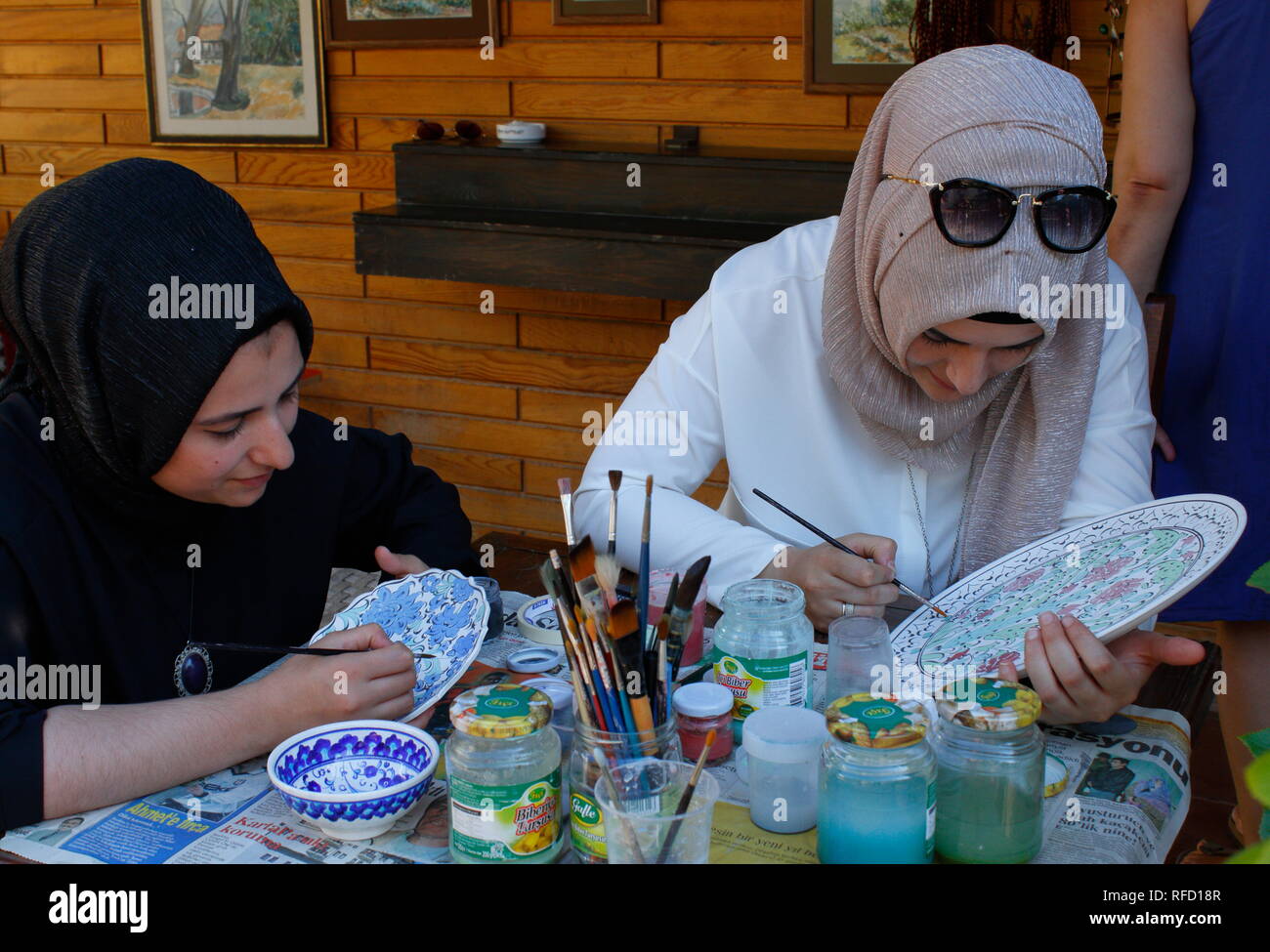 Bursa, Iznik, Turkey - The processing of the famous Iznik tile patterns ...
