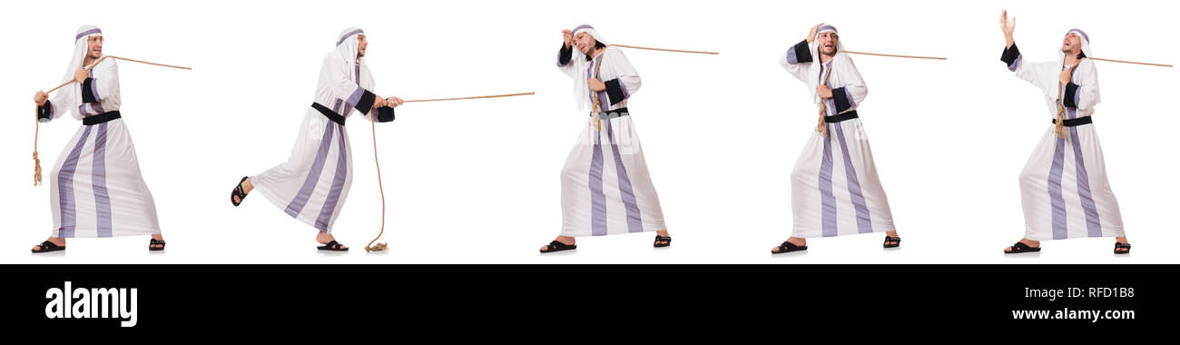 Arab man pulling rope in tug of war concept Stock Photo - Alamy