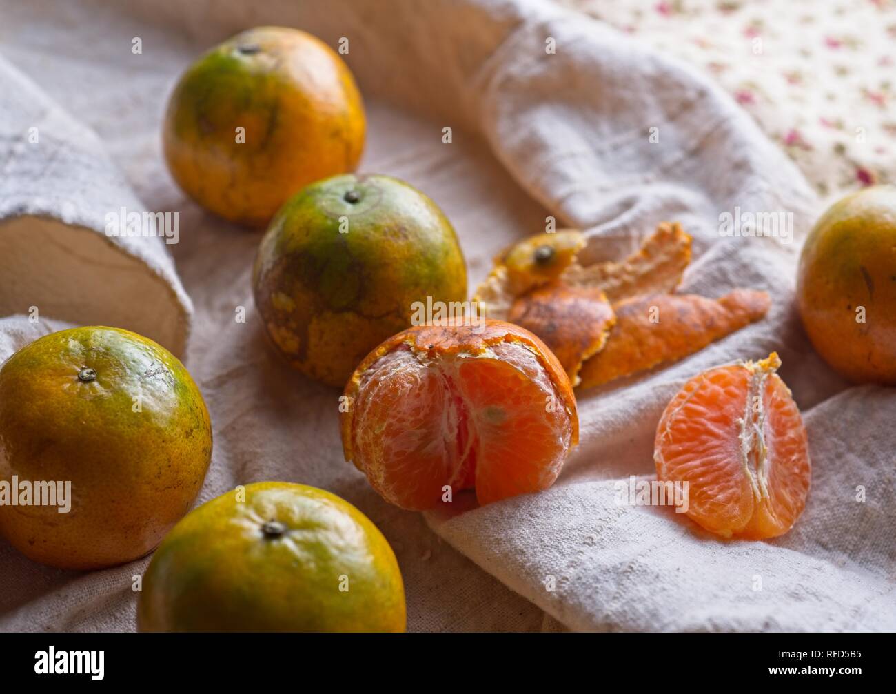 Tangerines orange on napkin Stock Photo - Alamy