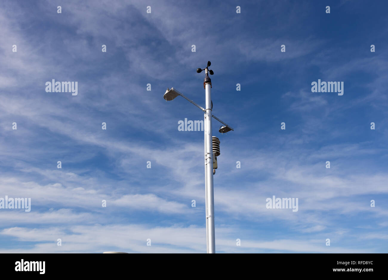 Many weather meter on white pole by the sky Stock Photo - Alamy