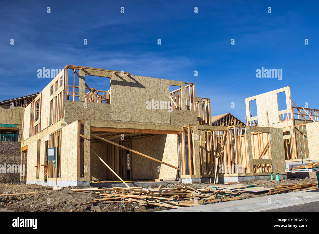 New Home Construction In Framing Stages Stock Photo Alamy new-home-construction-in-framing-stages-stock-photo-alamy