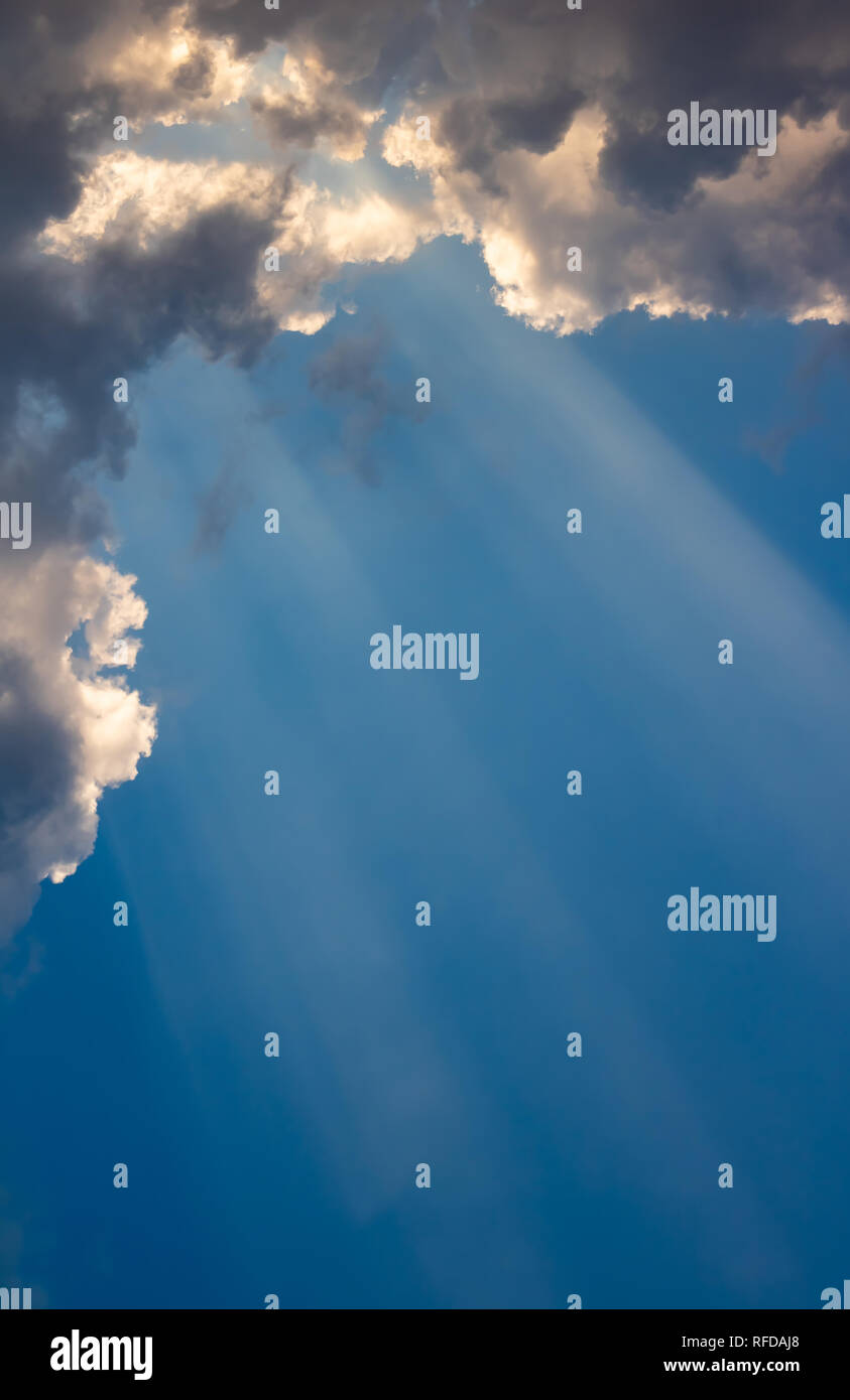Sun shines through storm clouds hi-res stock photography and images - Alamy