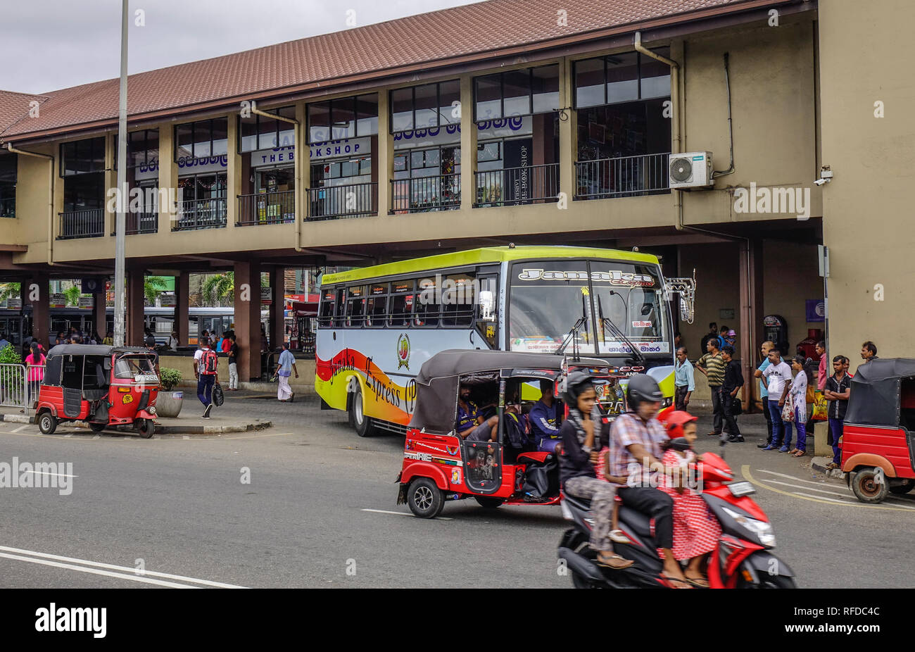 Galle, Sri Lanka - Dec 22, 2018. People and vehicles at main bus ...