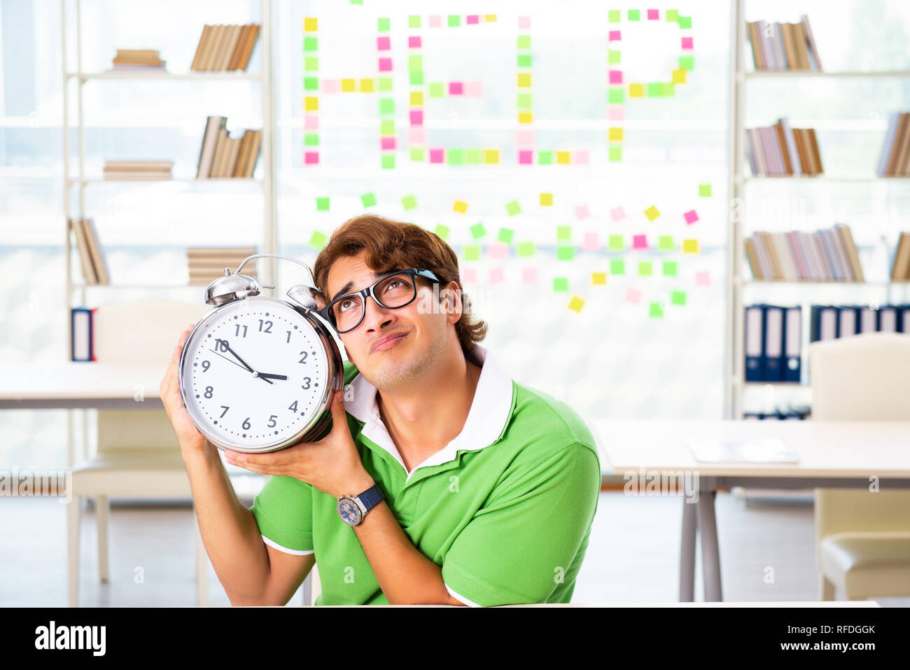 Student struggling at the exam in classroom Stock Photo - Alamy