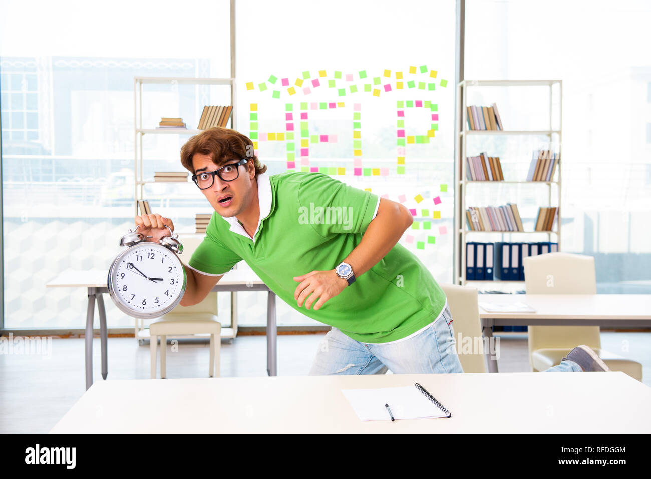 Student struggling at the exam in classroom Stock Photo - Alamy