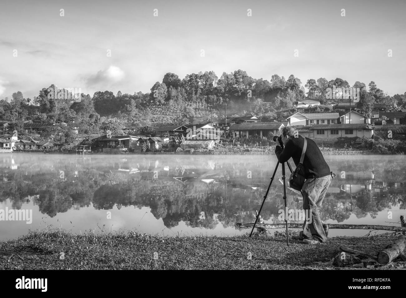 Photographer taking photo of amazing landscape sunrise. filter effect ...