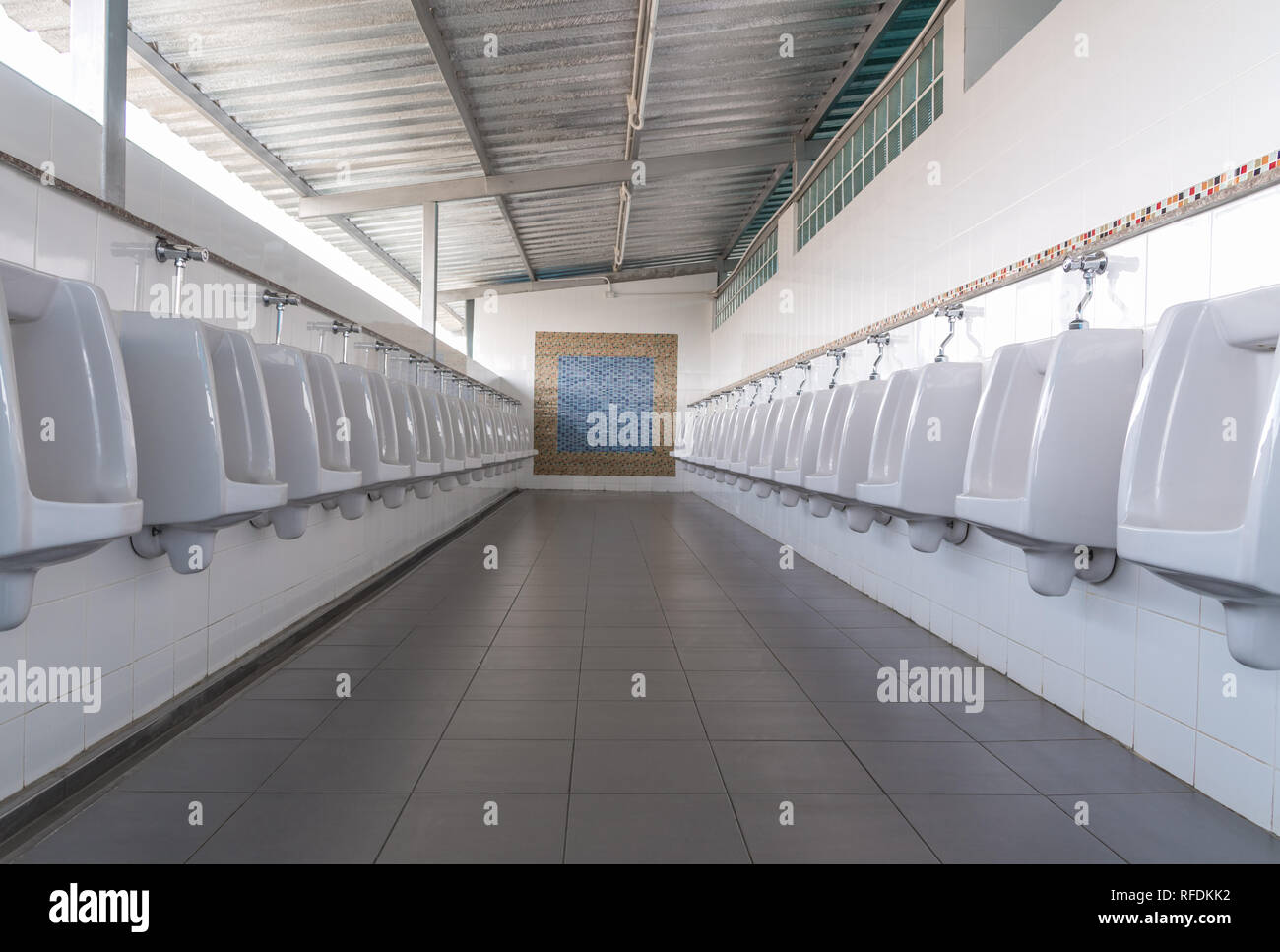 Row of outdoor urinals men public toilet Stock Photo - Alamy