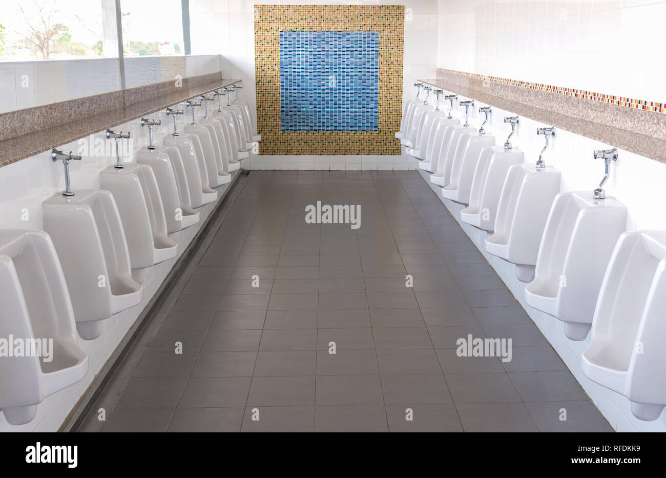 Row of outdoor urinals men public toilet Stock Photo - Alamy