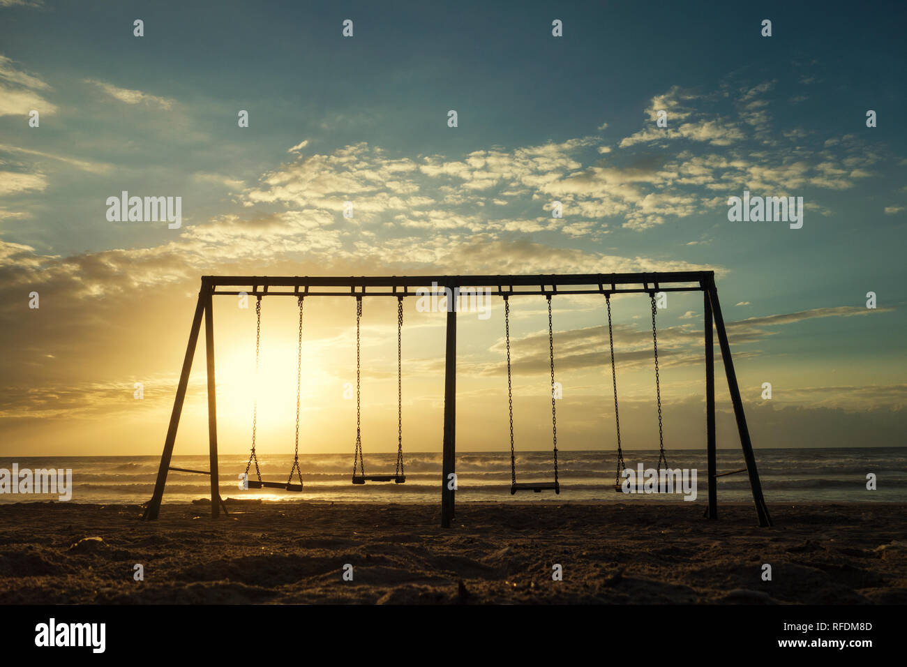 Swing at the beach hi-res stock photography and images - Alamy