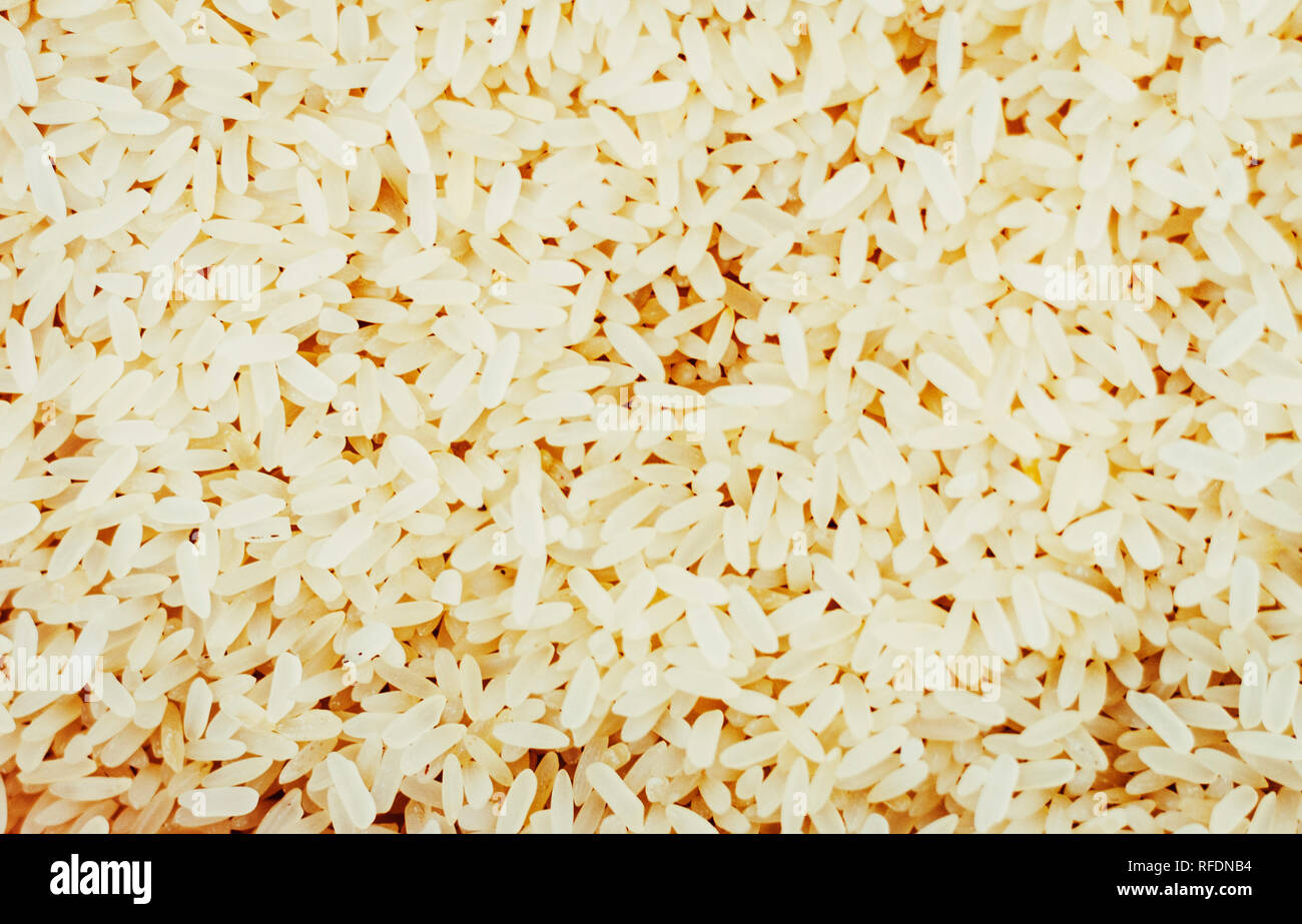 Organic White Long Rice Background Close-up Texture top view Stock ...