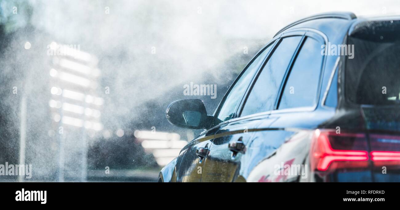 Spring Car Pressure Washing. Modern Vehicle Cleaning Stock Photo - Alamy