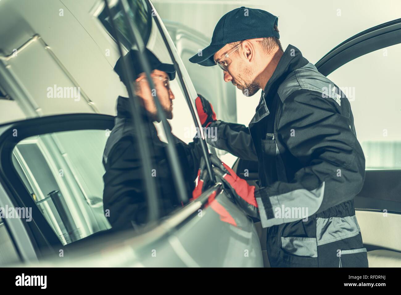 Vehicle Mechanic Job. Caucasian Auto Service Worker in his 30s During ...