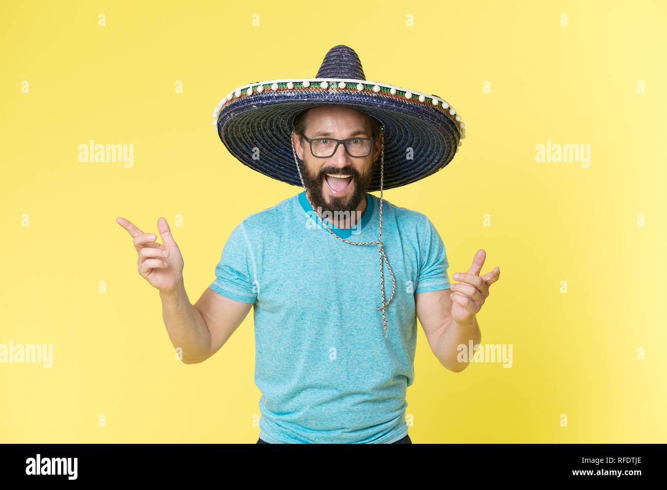 Celebrate traditions. Man on smiling face in sombrero hat celebrating ...