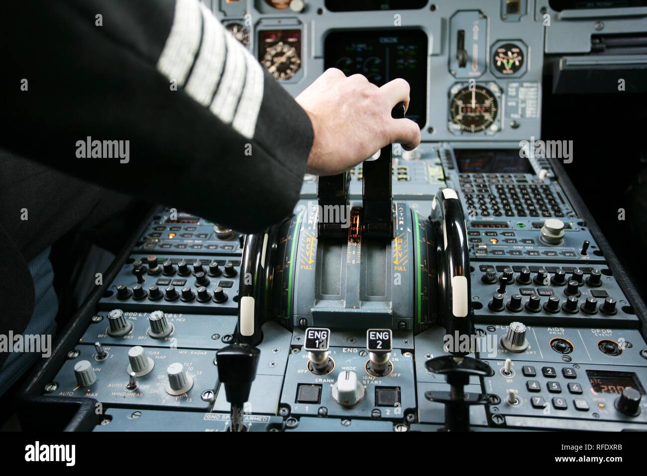 Pilot in cockpit of an Airbus A319, take off, engine power Stock Photo ...