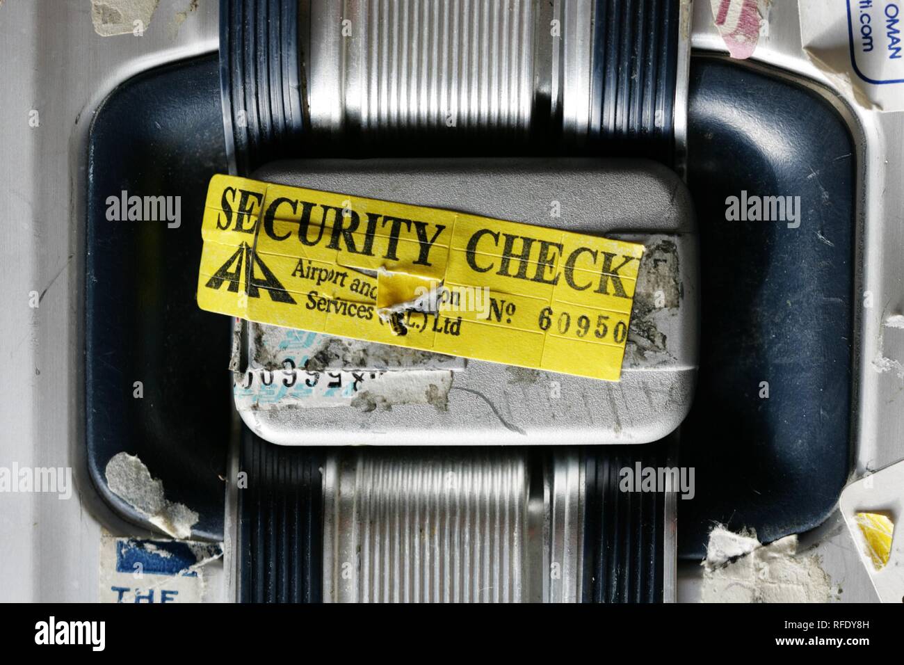 Suitcase with airport security lables, Security Checked Stock Photo - Alamy