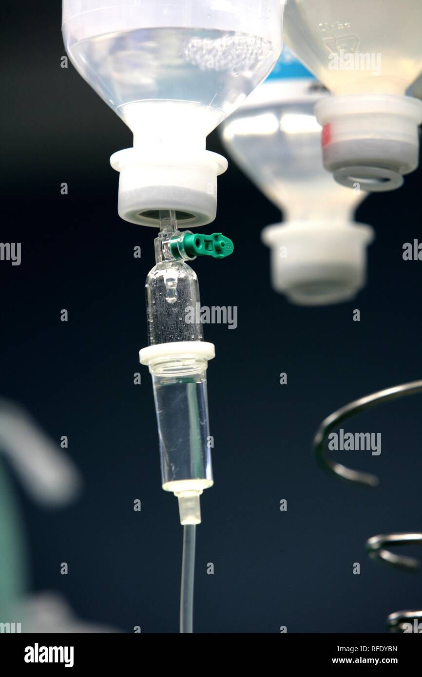 Bottle with infusion liquid for a patient during operation Stock Photo ...