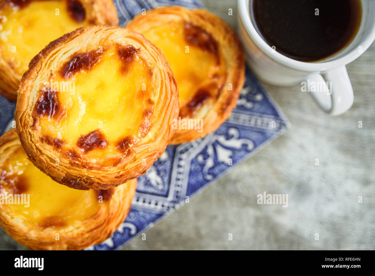 Portugal egg tart Pastel de Nata with azulejo tile Stock Photo - Alamy