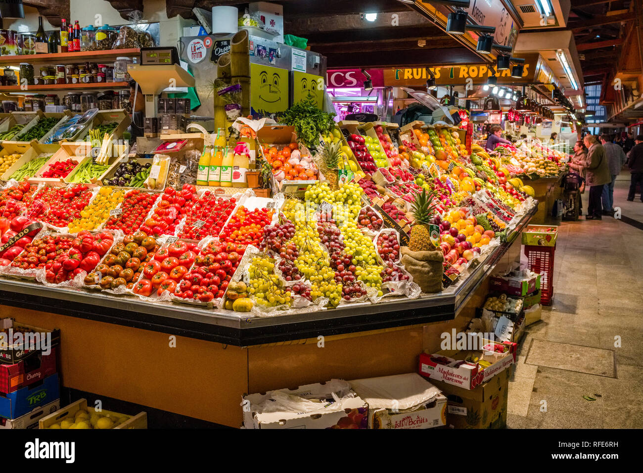 Fruits and vegetables are sold inside the Mercat de Sant Josep de la ...