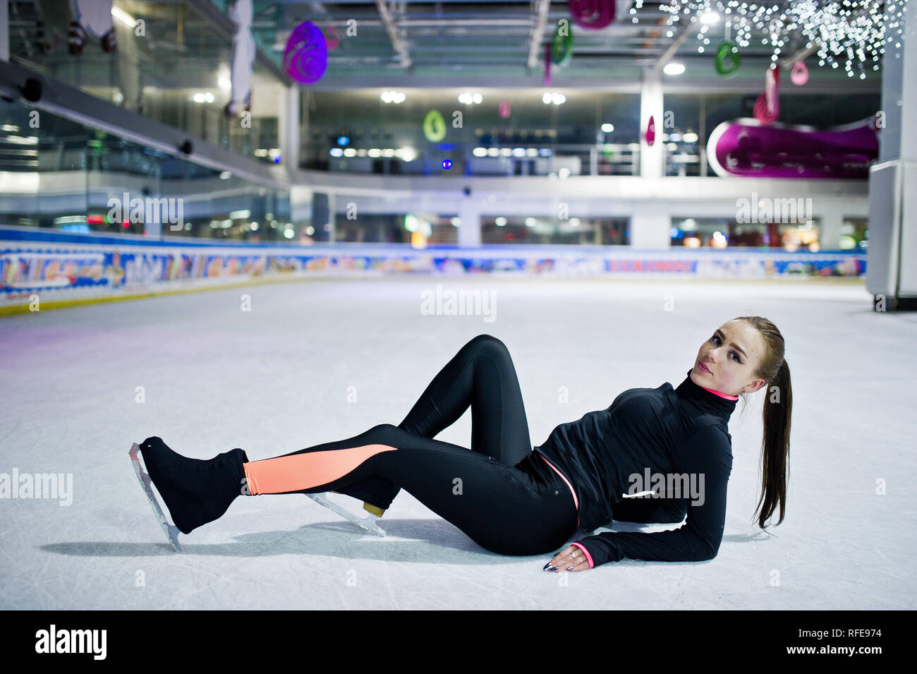 Figure skater woman at ice skating rink Stock Photo - Alamy