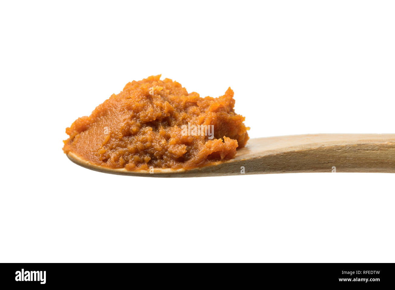 Wooden spoon with Japanese miso paste isolated on white background ...