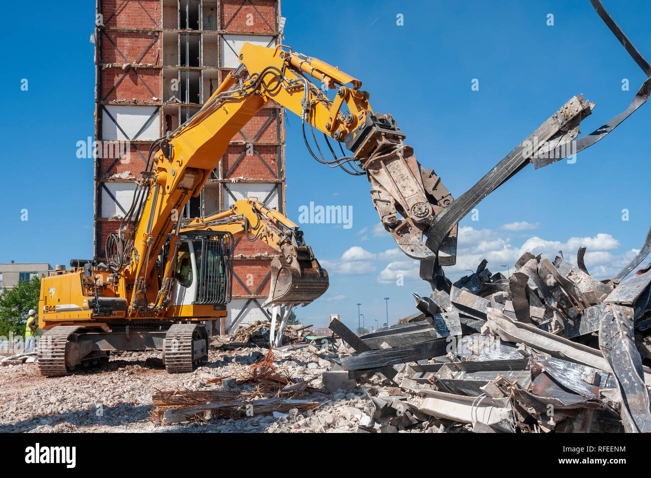 Demolition excavators equipped with steel shears in action Stock Photo ...