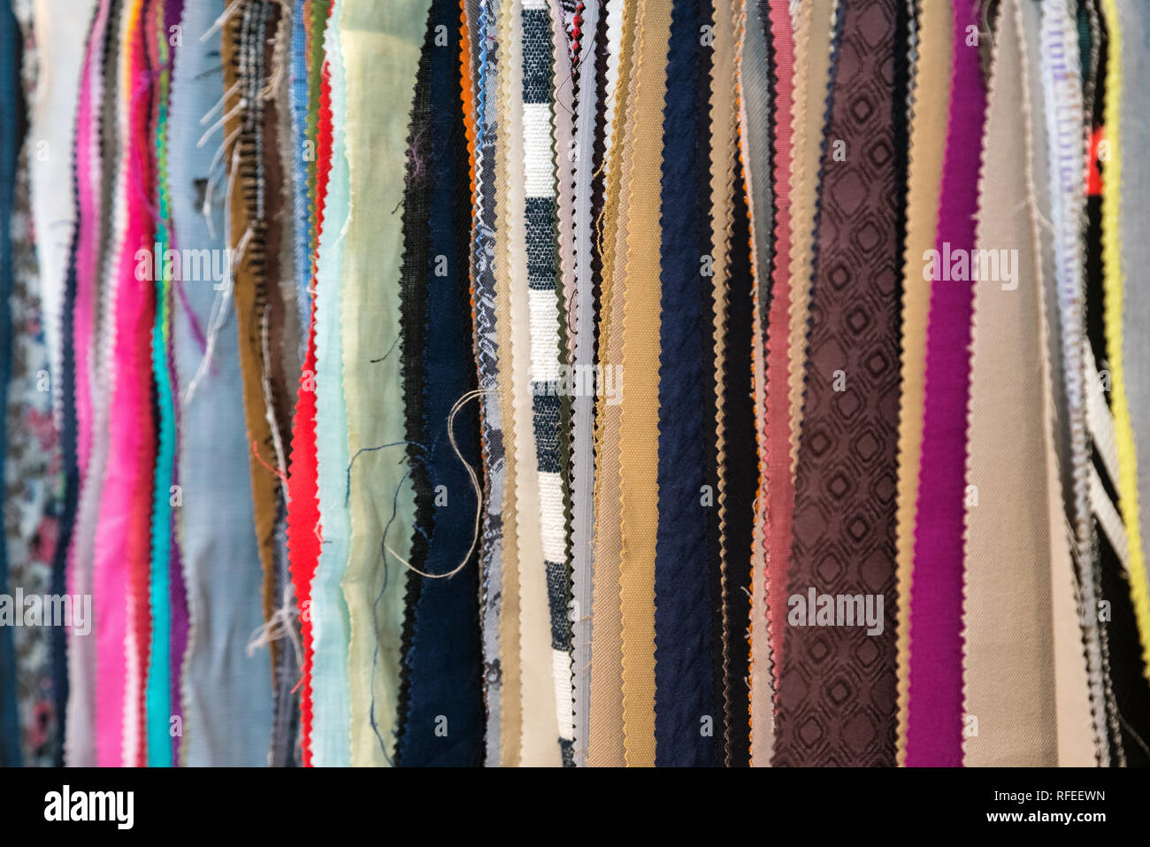 Fabric and textiles samples in a factory shop or store. Different ...