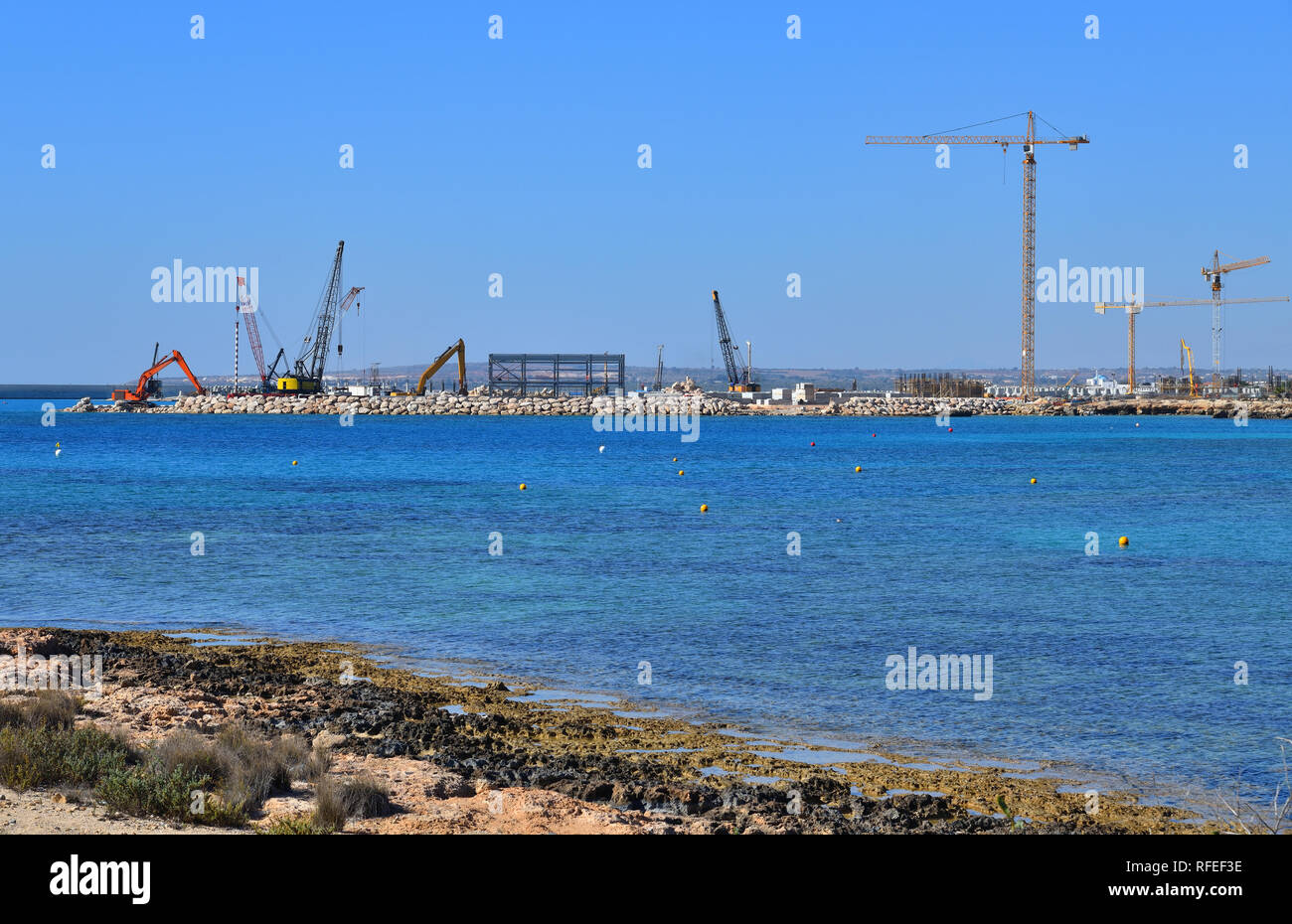 Construction of pier on the sea coast Stock Photo - Alamy