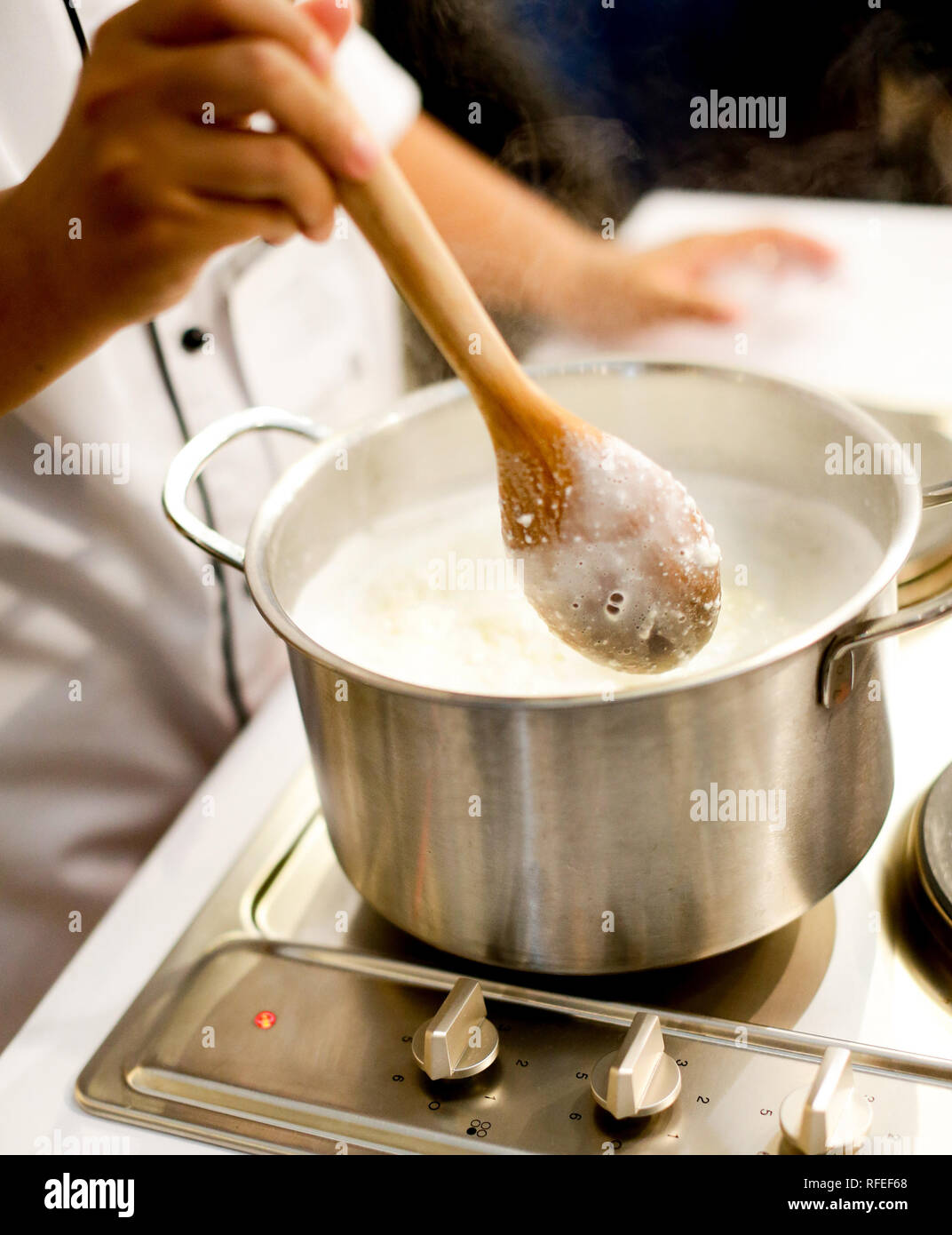 Chef cooking food in the kitchen, Chef preparing food Stock Photo - Alamy