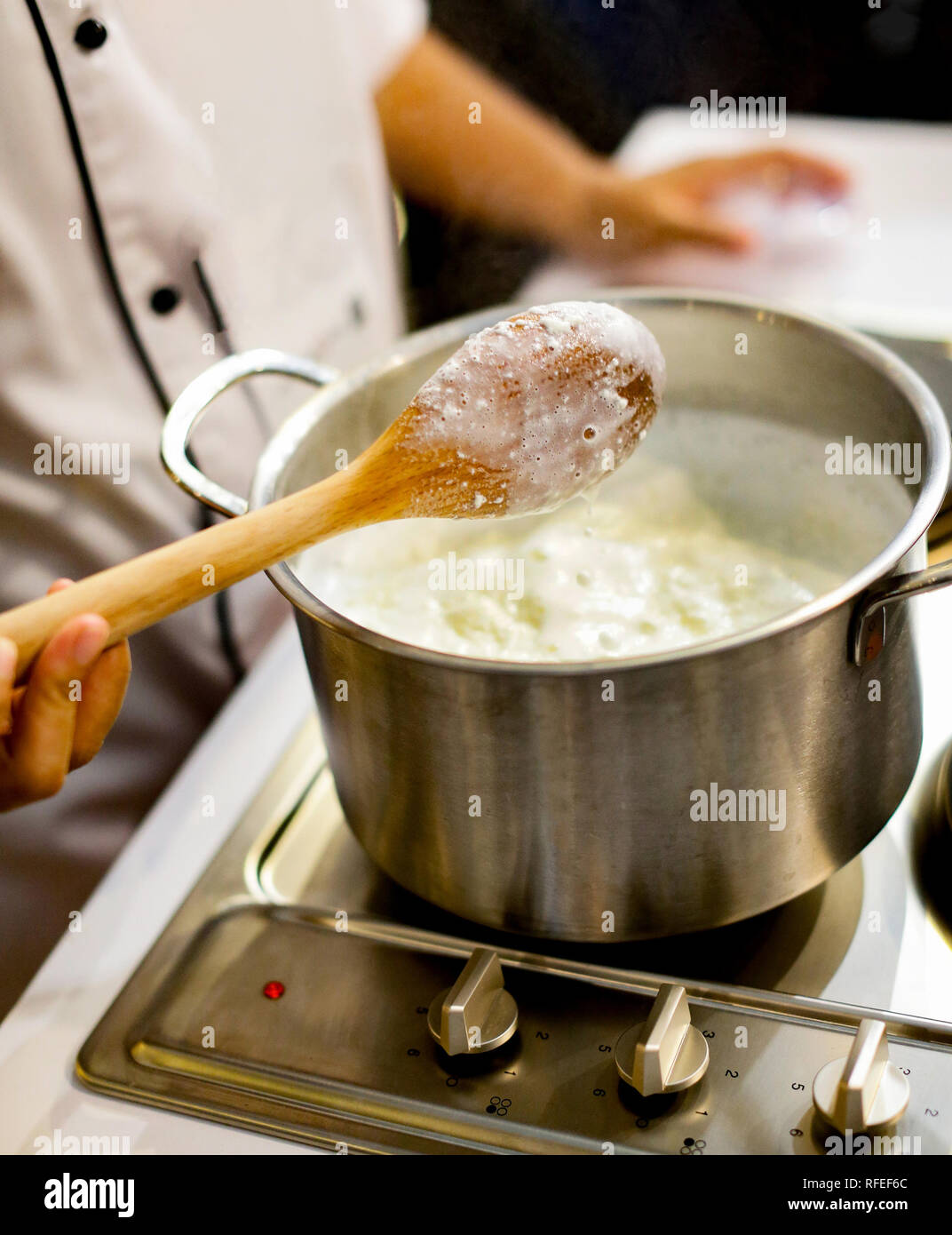 Chef cooking food in the kitchen, Chef preparing food Stock Photo - Alamy