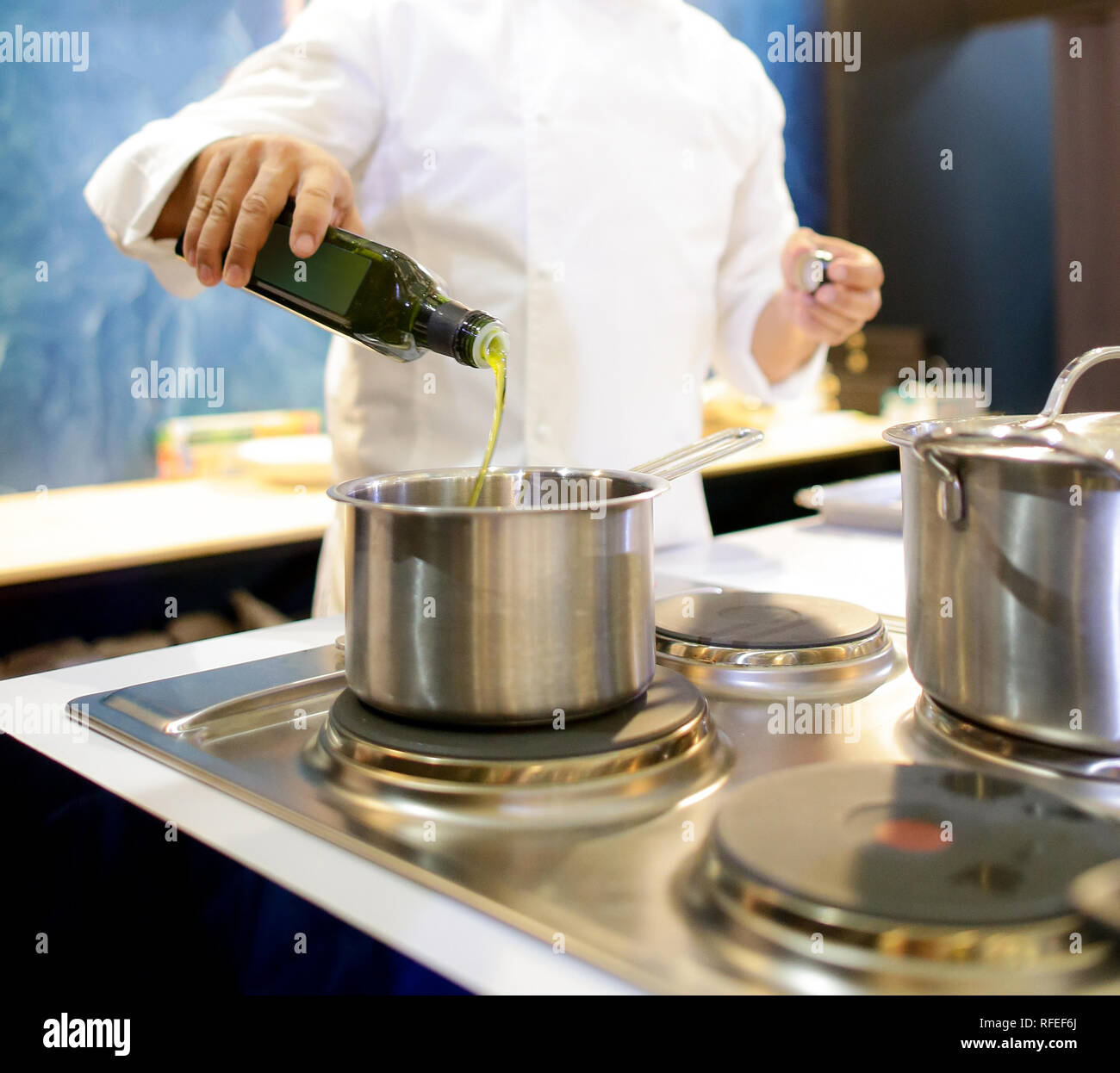 Chef cooking food in the kitchen, Chef preparing food Stock Photo - Alamy