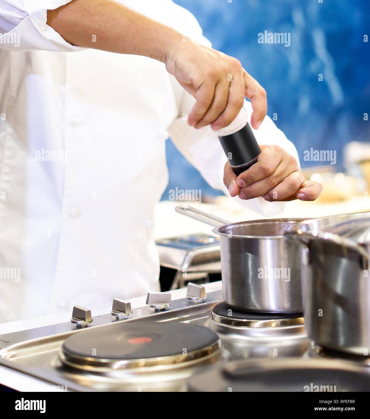 Chef cooking food in the kitchen, Chef preparing food Stock Photo - Alamy