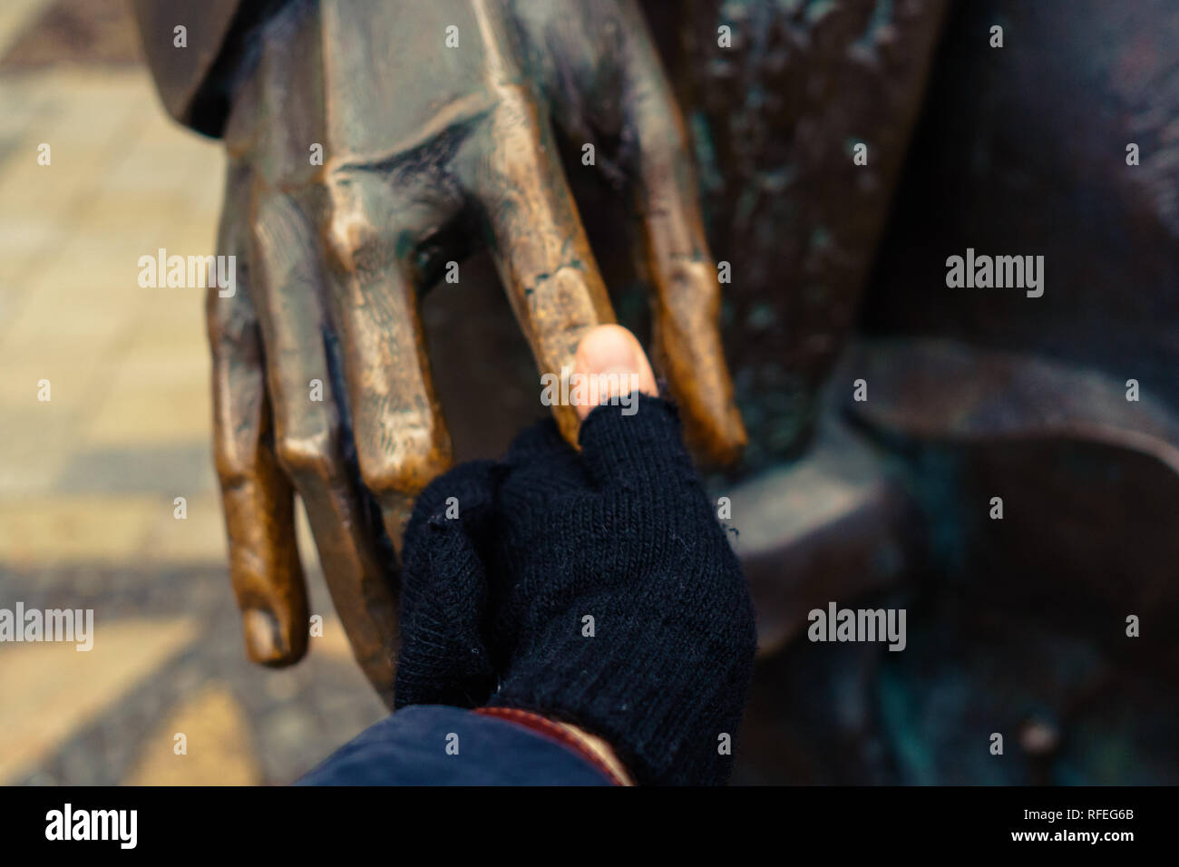 Boy hand touchs hans christian andersen statue. Touching the statue ...