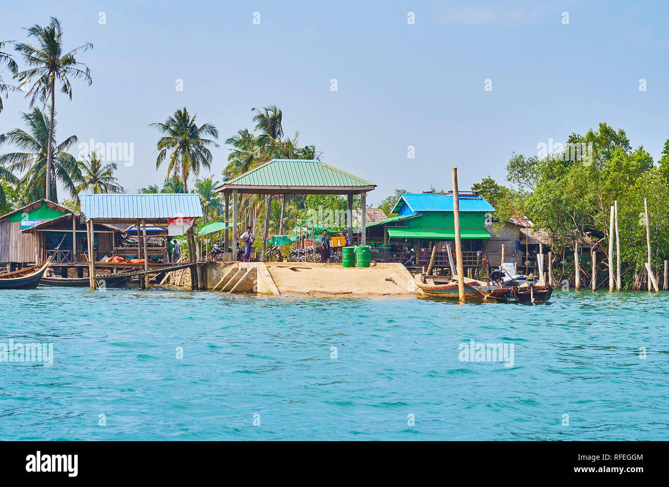 KANGYI, MYANMAR - MARCH 1, 2018: The ferry terminal of the village with ...