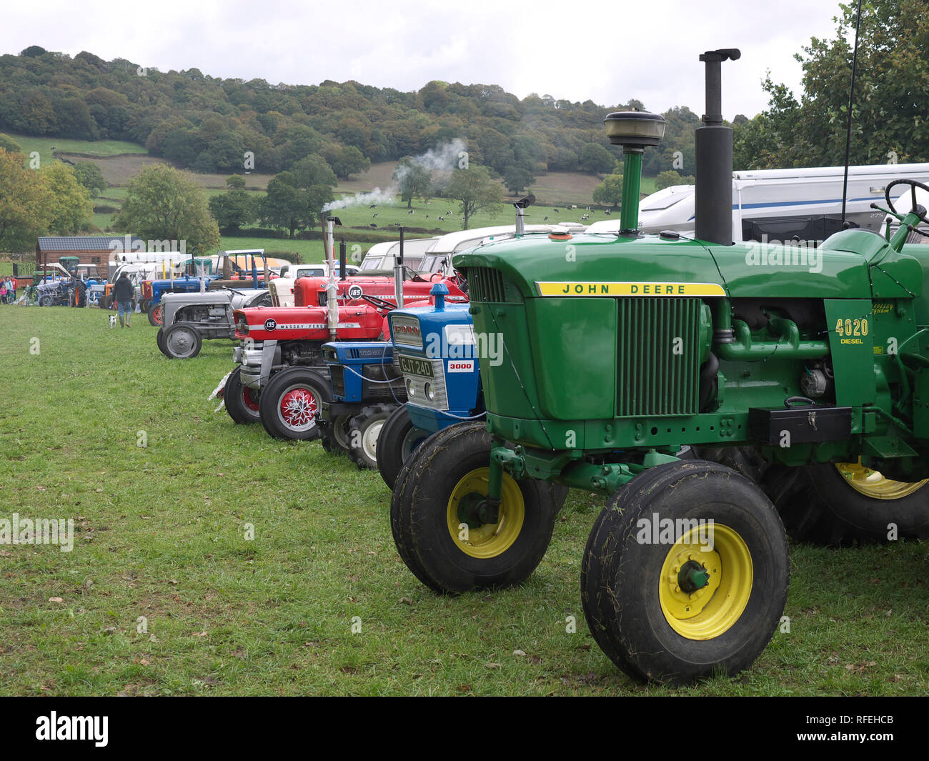 Tractor line up at Ashover festival of lights Stock Photo - Alamy