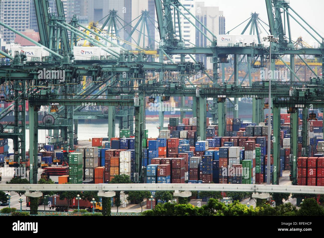 SGP, Singapore: Sea port, container port. Skyline of Downtown Singapore ...