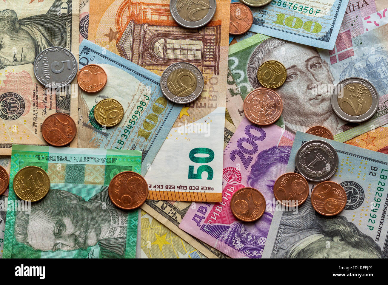 Colorful abstract background made of different metal coins, American ...