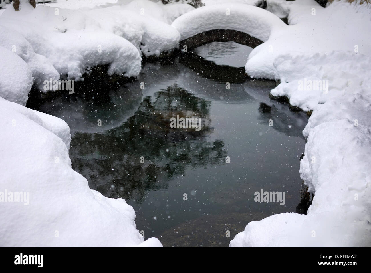 Stone bridge over pond in hi-res stock photography and images - Alamy