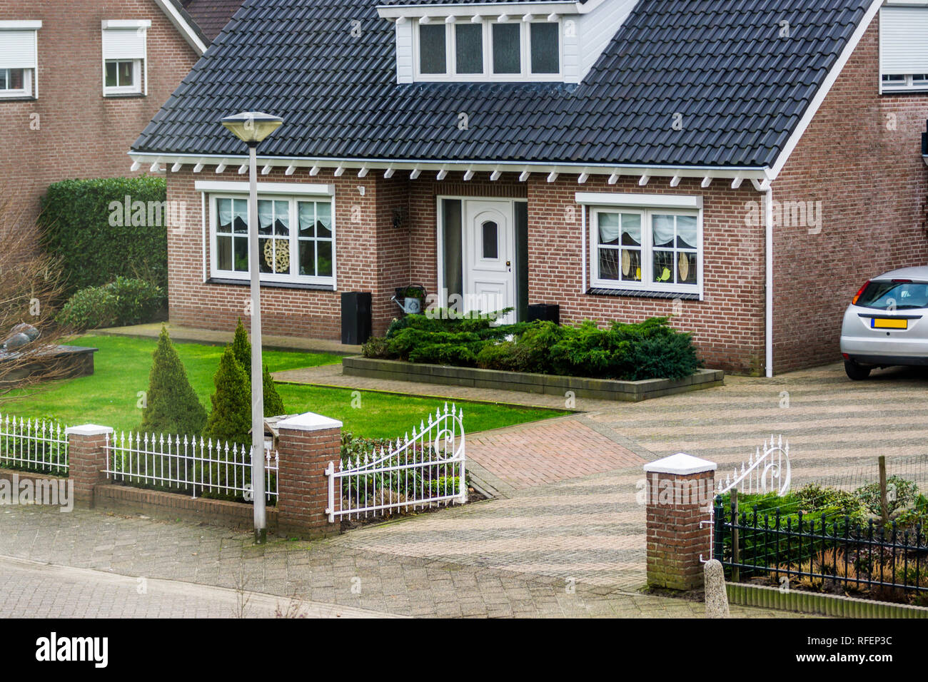 luxurious dutch bungalow from street view, with beautiful garden and a ...