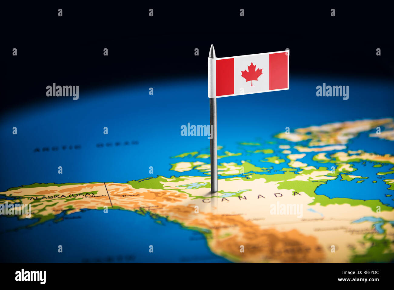 Canada marked with a flag on the map Stock Photo - Alamy
