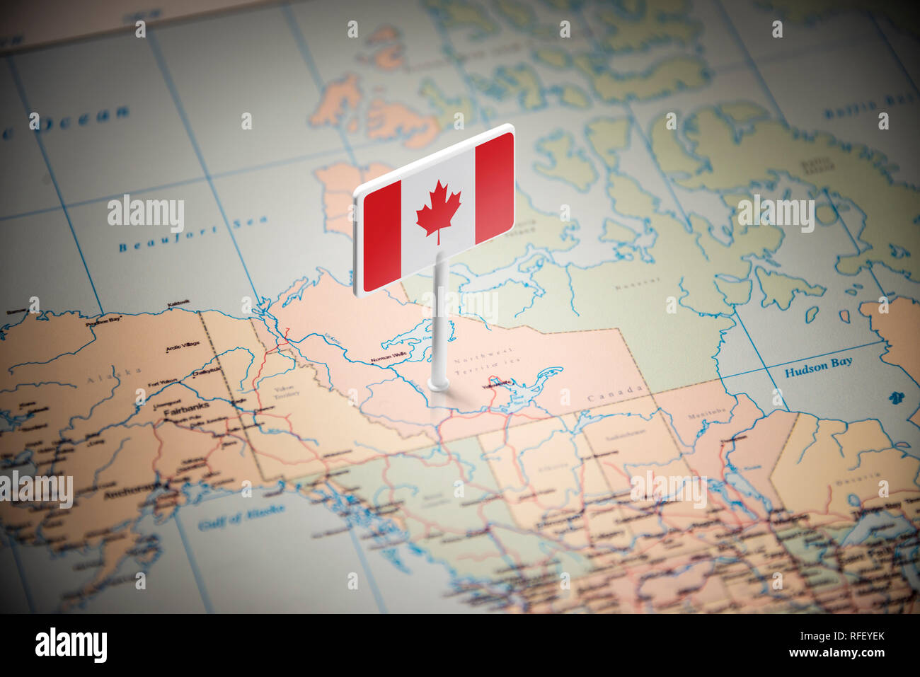 Canada marked with a flag on the map Stock Photo - Alamy