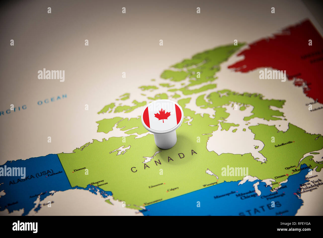 Canada marked with a flag on the map Stock Photo - Alamy