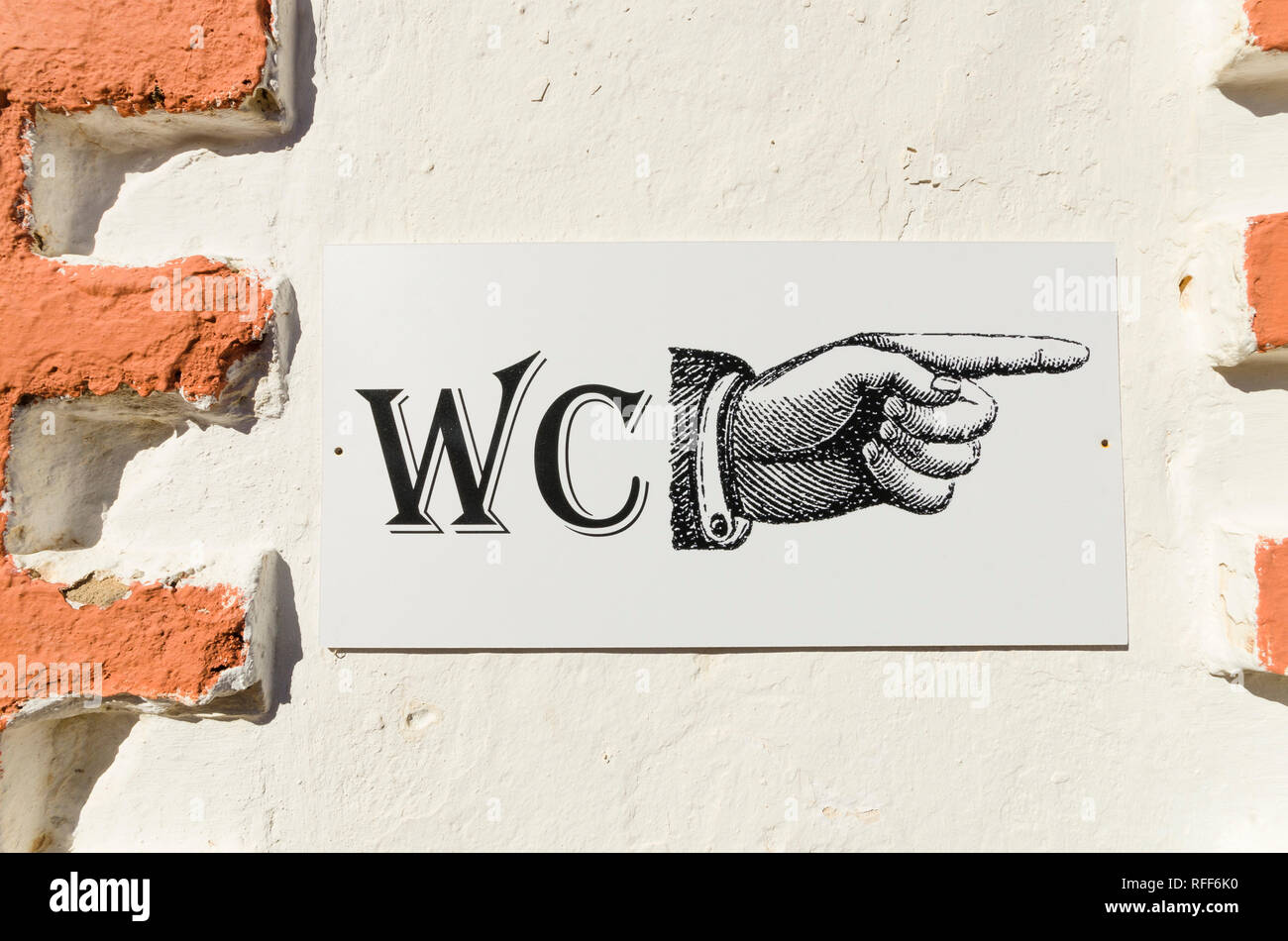 Hand pointing toilets hi-res stock photography and images - Alamy